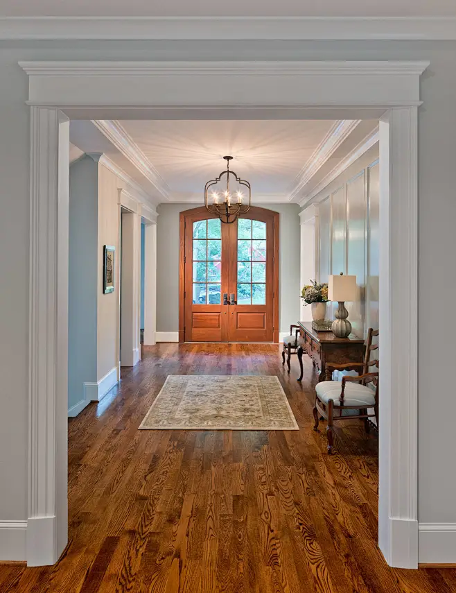 Entryway - large traditional dark wood floor entryway idea in DC Metro ...