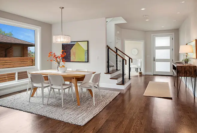 Example of a trendy dark wood floor dining room design in Seattle with ...
