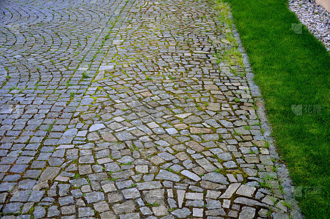 stone path lined with regular granite cubes the ce