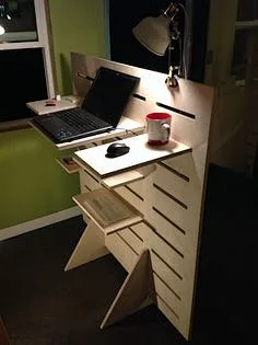 This is our standup desk with multiple configurable shelves for storage ...