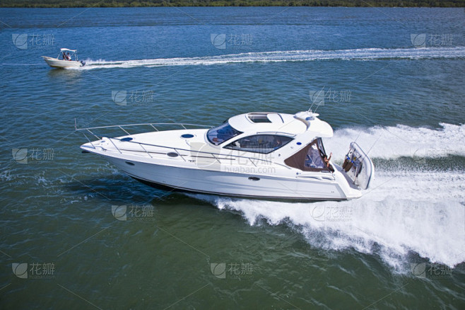 Two small motor boats sailing in the sea