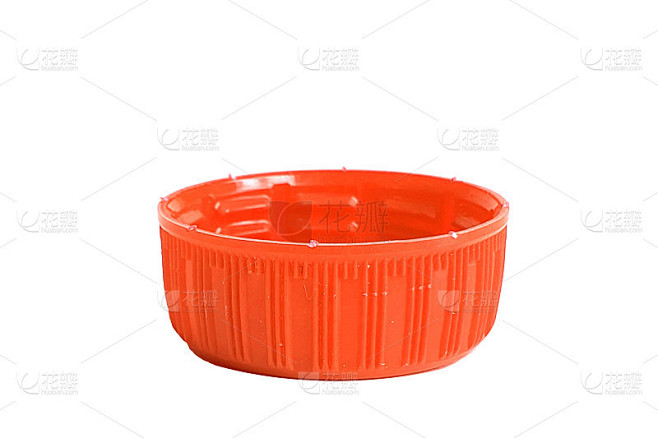 Red soft drink bottle cap on white