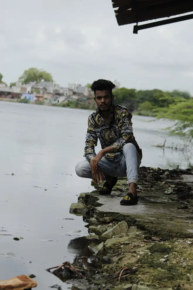 Photo by Nadeem Choudhary on Unsplash : boy sitting – Download this ...