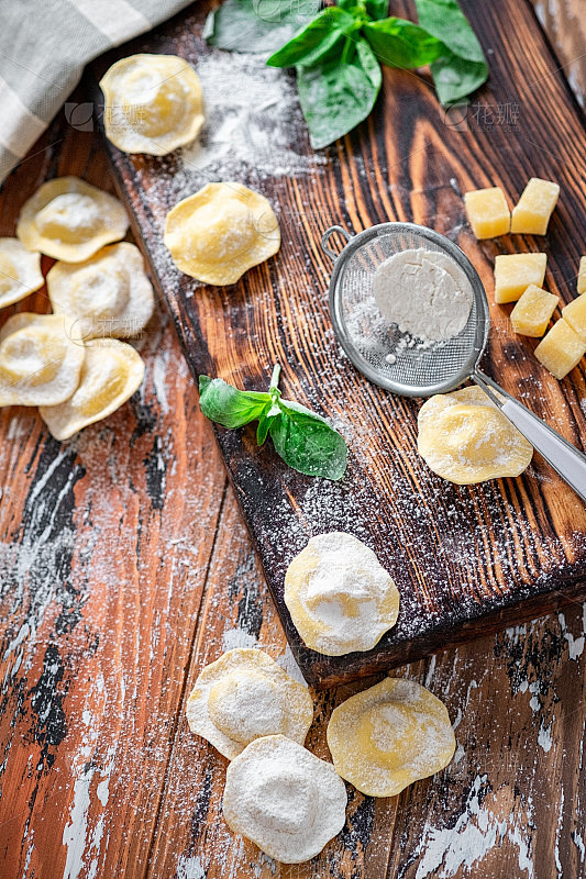 Raw Italian Ravioli pasta with Parmesan and Basil