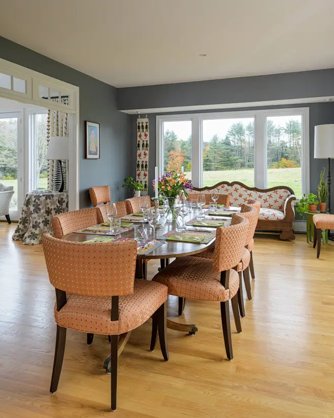 Enclosed dining room - large transitional light wood floor and beige ...