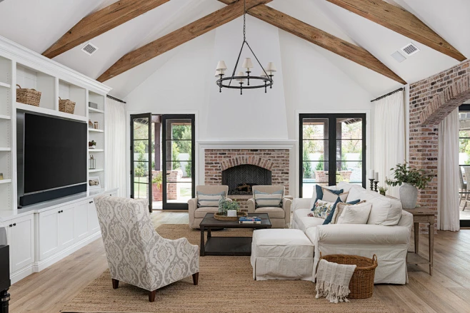 Example of a large cottage open concept medium tone wood floor and ...