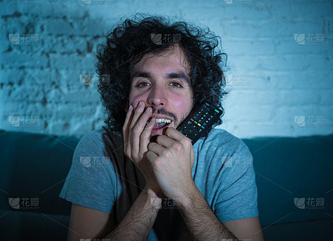 Young sensitive man hocked watching romantic movie