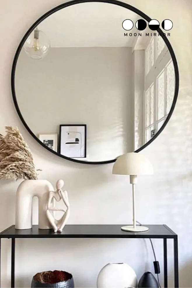 Large round mirrors can be a statement piece in every room in the house ...