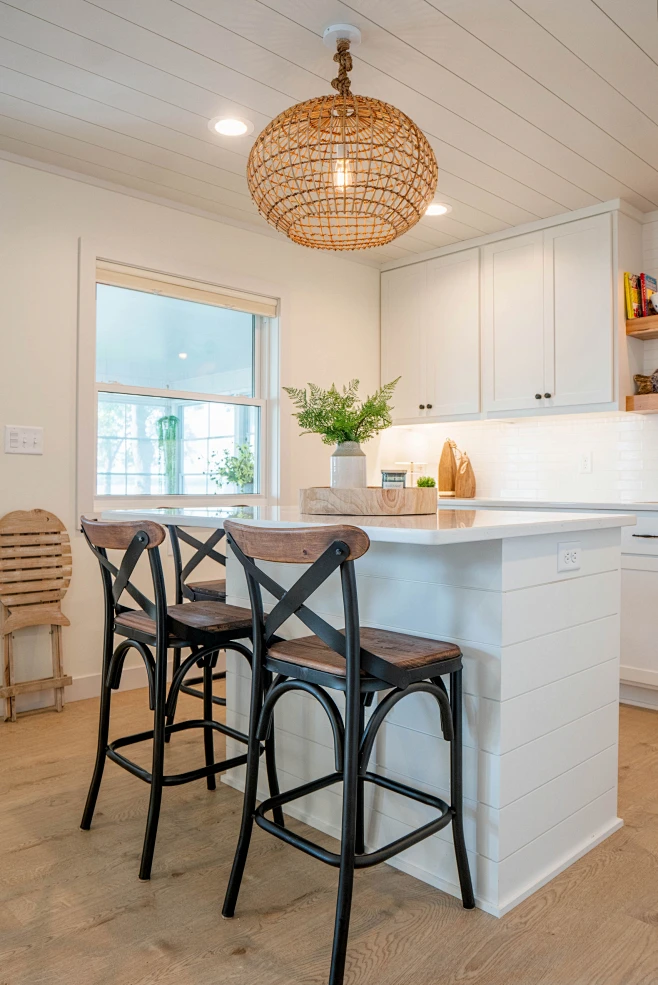 Mid-sized beach style l-shaped light wood floor and beige floor eat-in ...