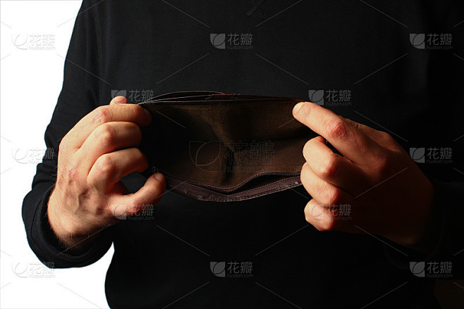 Wallet without money in hands on a white backgroun