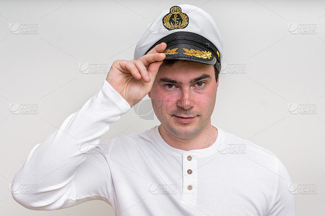 Captain with sailor cap isolated on white