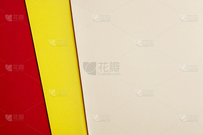 Colored cardboards background in beige yellow red tone. Copy spa
