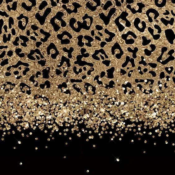 This may contain: gold and black leopard print wallpaper with lots of ...