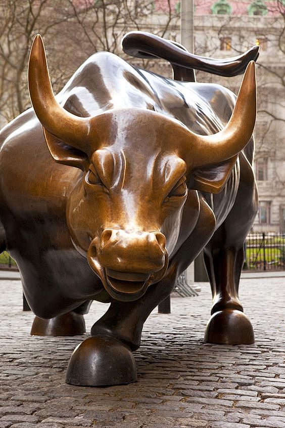 Charging Bull - bronze sculpture by Arturo Di Modica that stands in Bowling Green Park near Wall ...