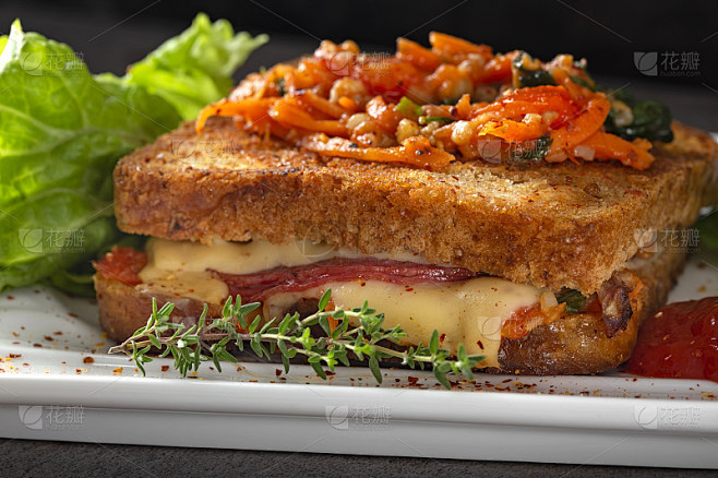 Worm sandwich made with cheese, salami and vegetab