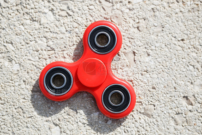 Fidget spinne.Modern spinning finger toy.