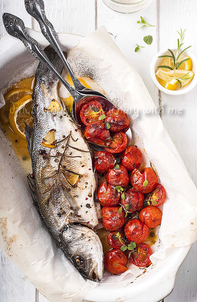 Roasted fish with tomatoes and herbs