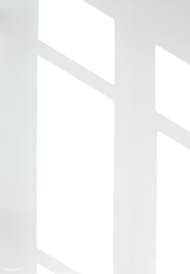 Shadow of a window on a white wall