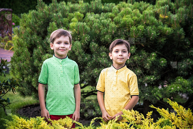 Group of happy children playing outdoors. Kids hav