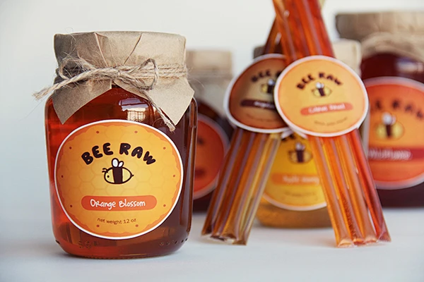 Bee Raw Honey : Package Design 1Bee Raw Honey.A line of honey with 1 ...