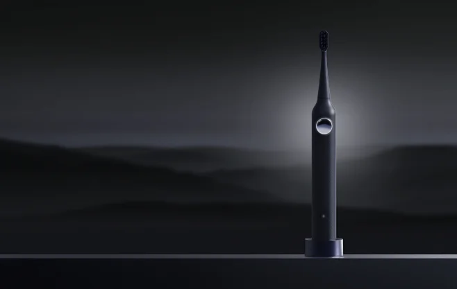 Electric Toothbrush E : The button symbolizing the Eclipse reflects ...