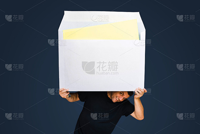 man holding a huge envelope