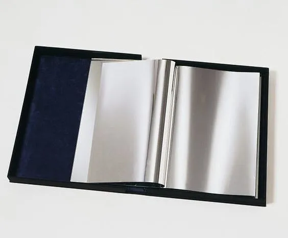The Mirror book/book | Christie, John | V&A: This text-less bookwork is ...