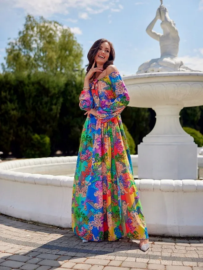 The long Spanish dress with binding at the neckline is made of very ...