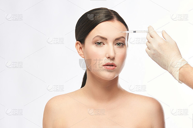 Face needle injection. Young woman cosmetology pro