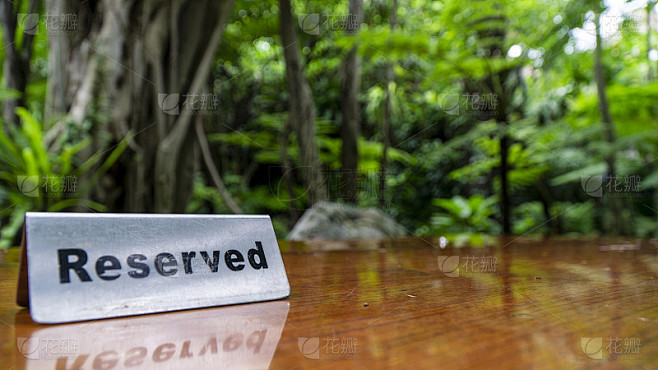 Reserved sign made out stainless steel plate on a