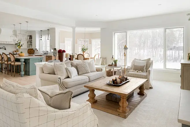 Example of a cottage open concept carpeted and beige floor living room ...