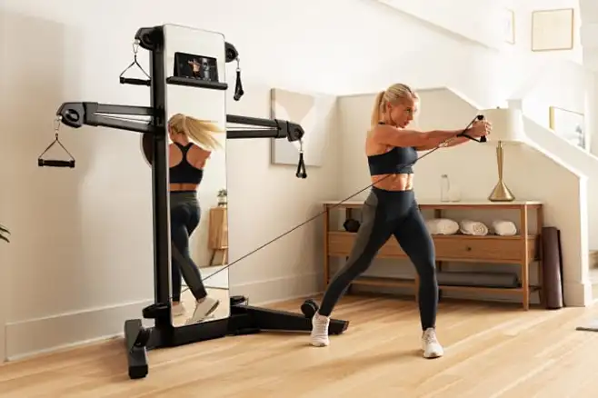 Woman Exercising with iFIT and the NordicTrack Fusion CST Studio ...