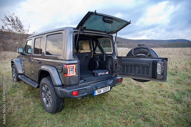 Jeep Wrangler Sahara. Car out of the way. Access to cargo space. 12-12 ...