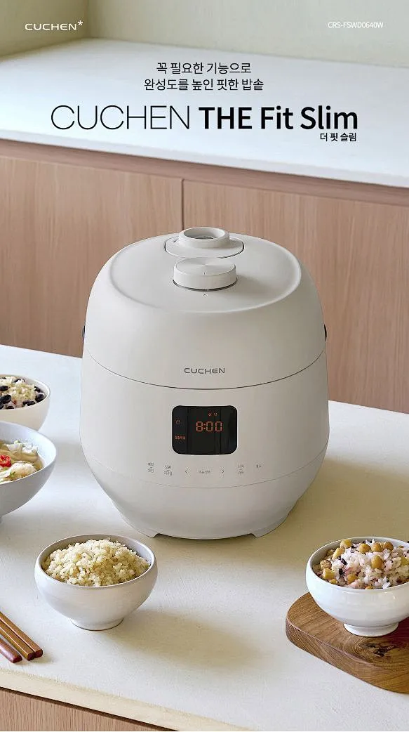 This may contain: the rice cooker is next to bowls and chopsticks on a ...