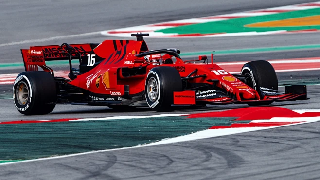 Ferrari F1 car on track during a turn-花瓣网