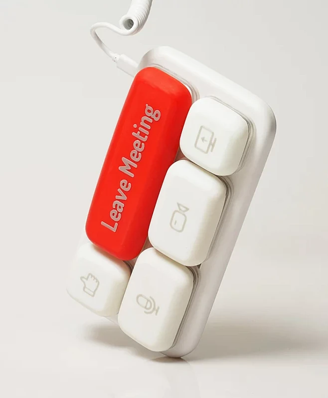 a red and white key board attached to a pair of headphones with ear ...