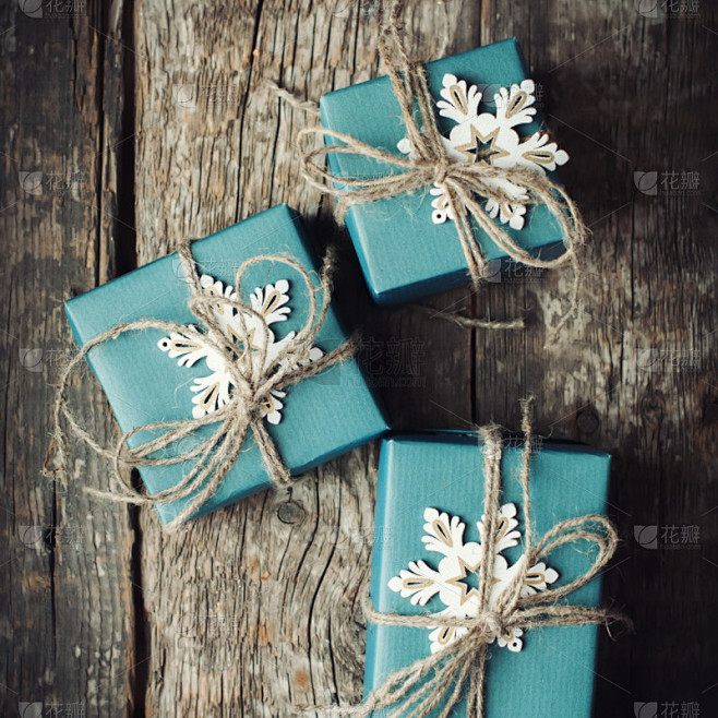 Three Festive Boxes in Blue Paper Decorated with S