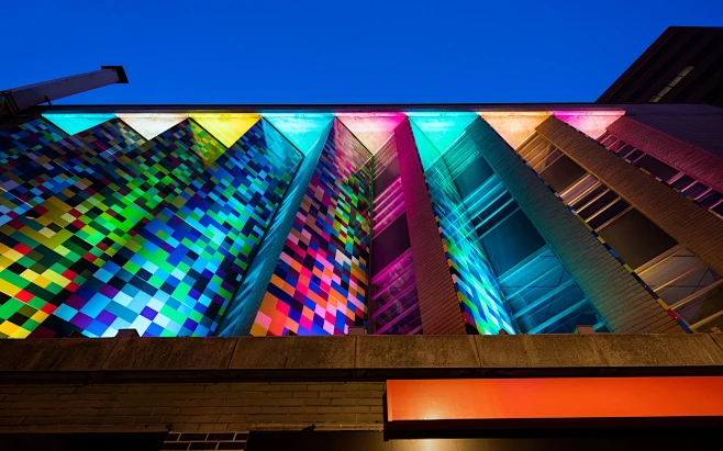 Lumenfacade luminaires light the bottom half, while Lumenbeam fixtures ...