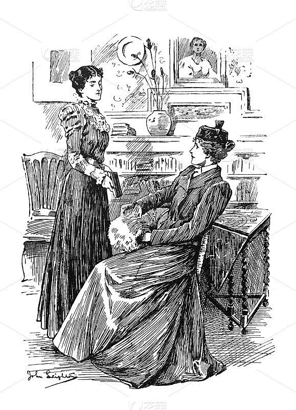 Two women talking in a living room .两个女人在客厅里谈话