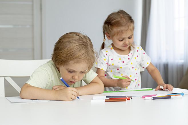 high-angle-cute-kids-drawing