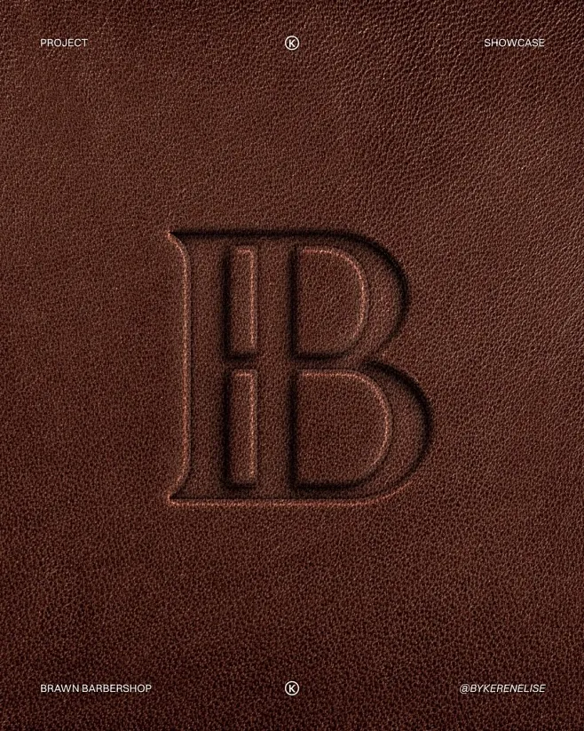 a brown leather cover with the letter b on it-花瓣网