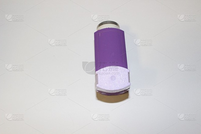 Purple rescue inhaler on white background, used fo