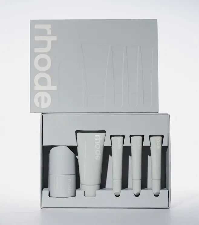 The Rhode Kit, From Left to Right: Peptide Glazing Fluid, Barrier Restore Cream, Peptide Lip ...