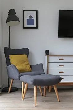 The grey armchair and matching footstool (Homesense) is 'brought to ...